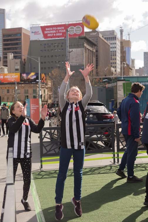 Footy Colours Day takes over Federation Square